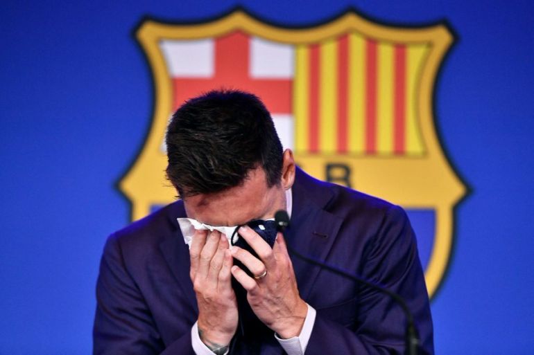 Lionel Messi crying while given a standing ovation
